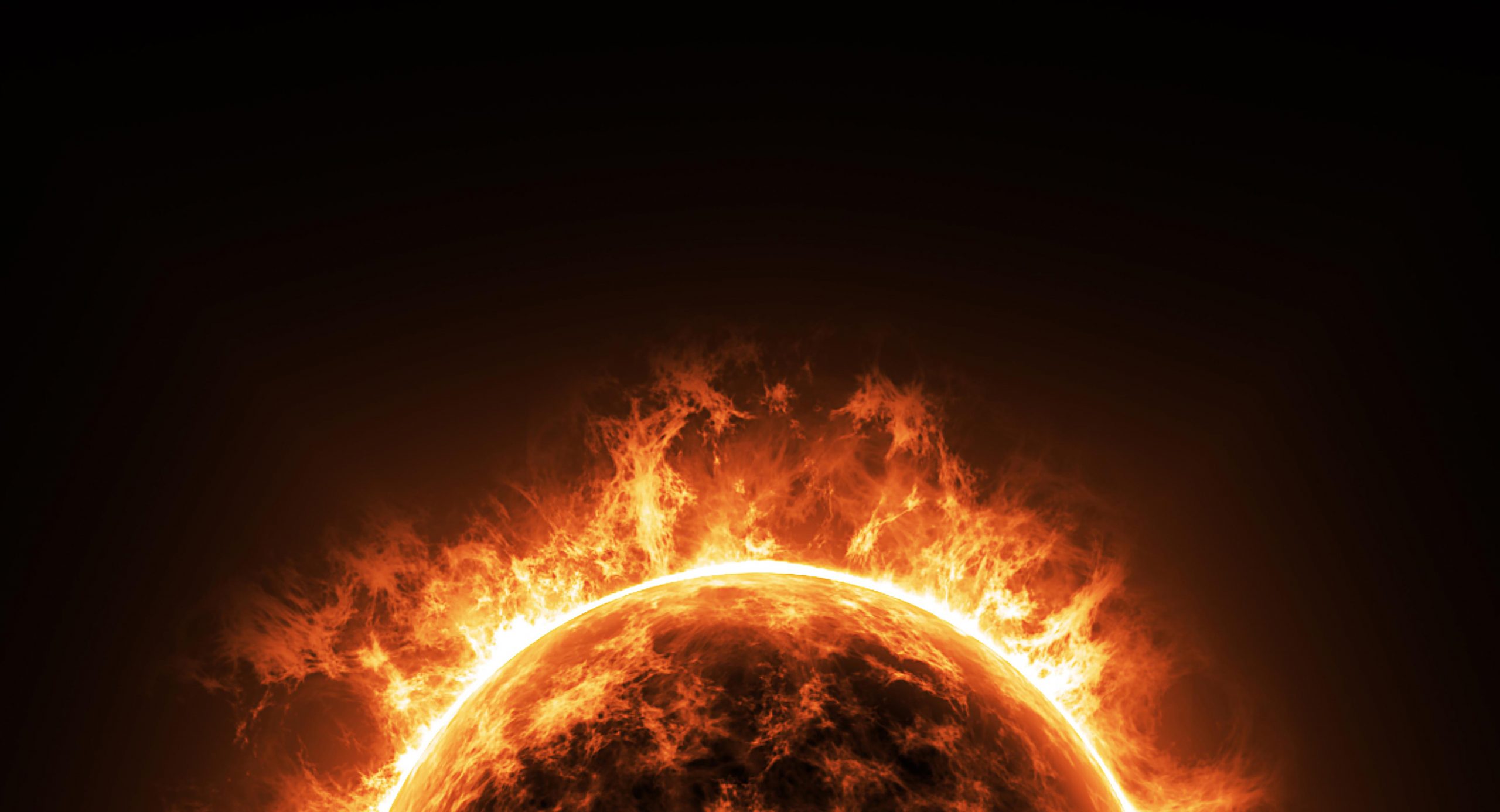 a big sun surface with solar flares and copy space on black background ...